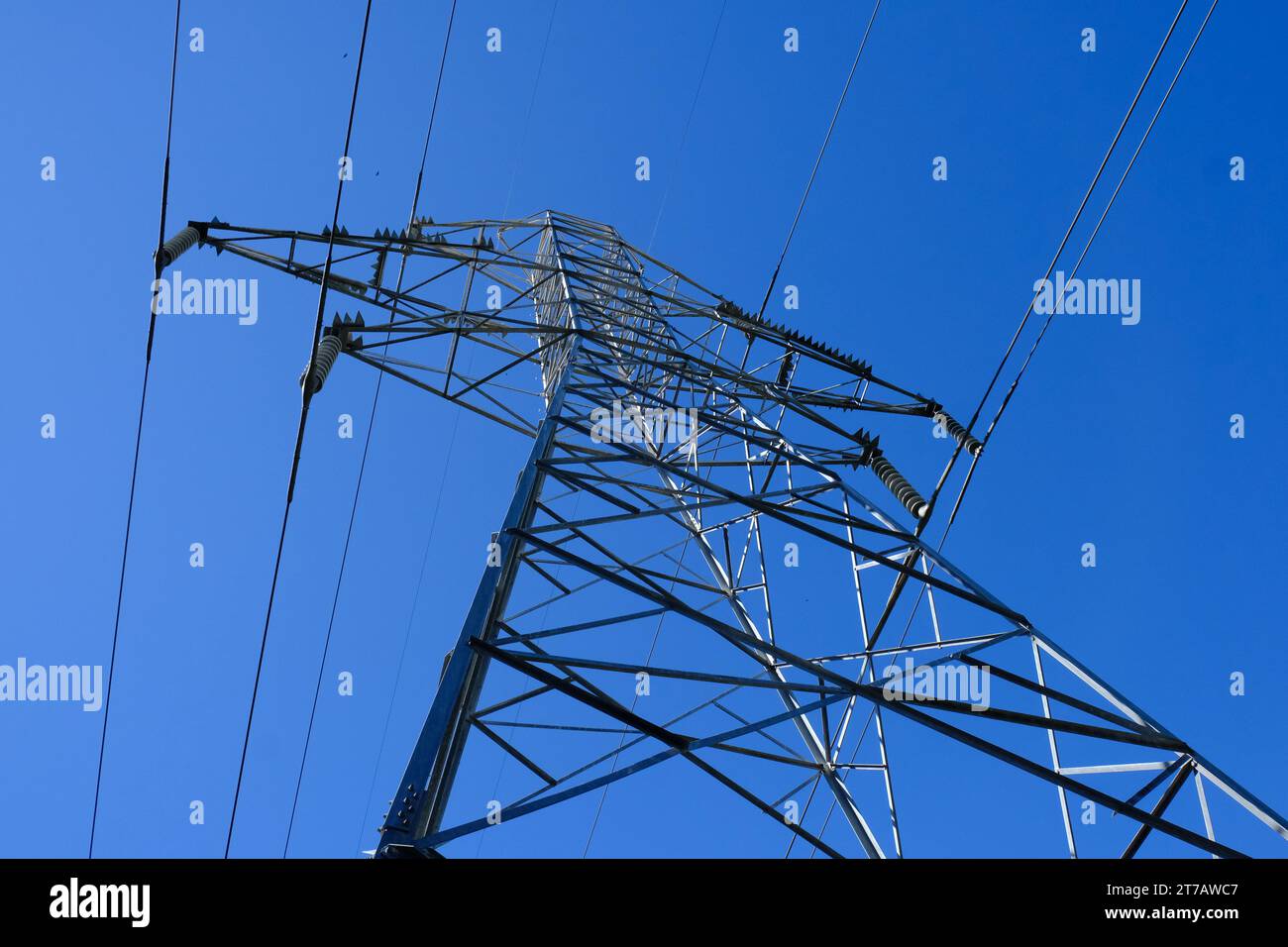 This is a photograph of an electric power line tower. It is located at ...