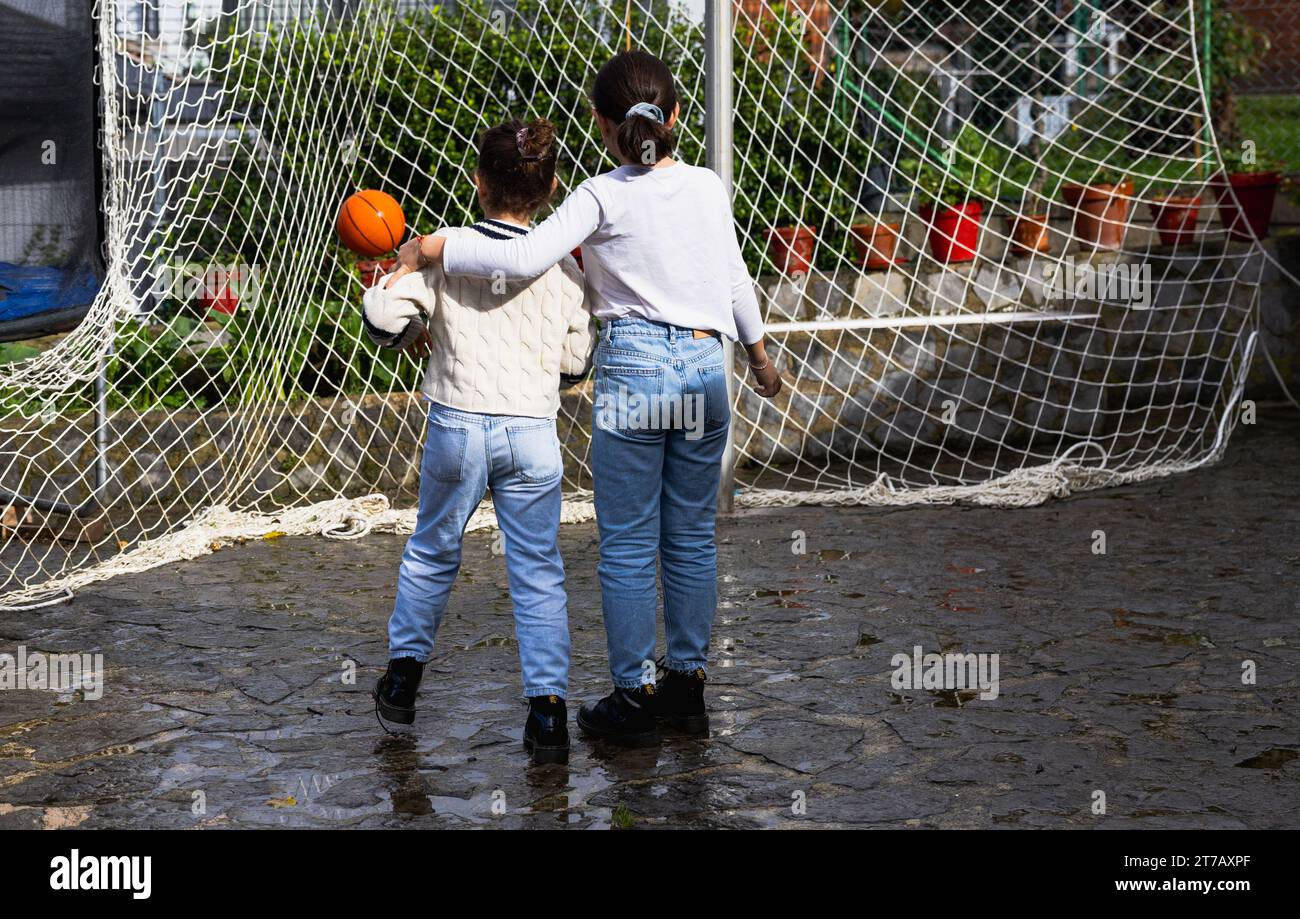 Two girls hugging hi-res stock photography and images - Alamy