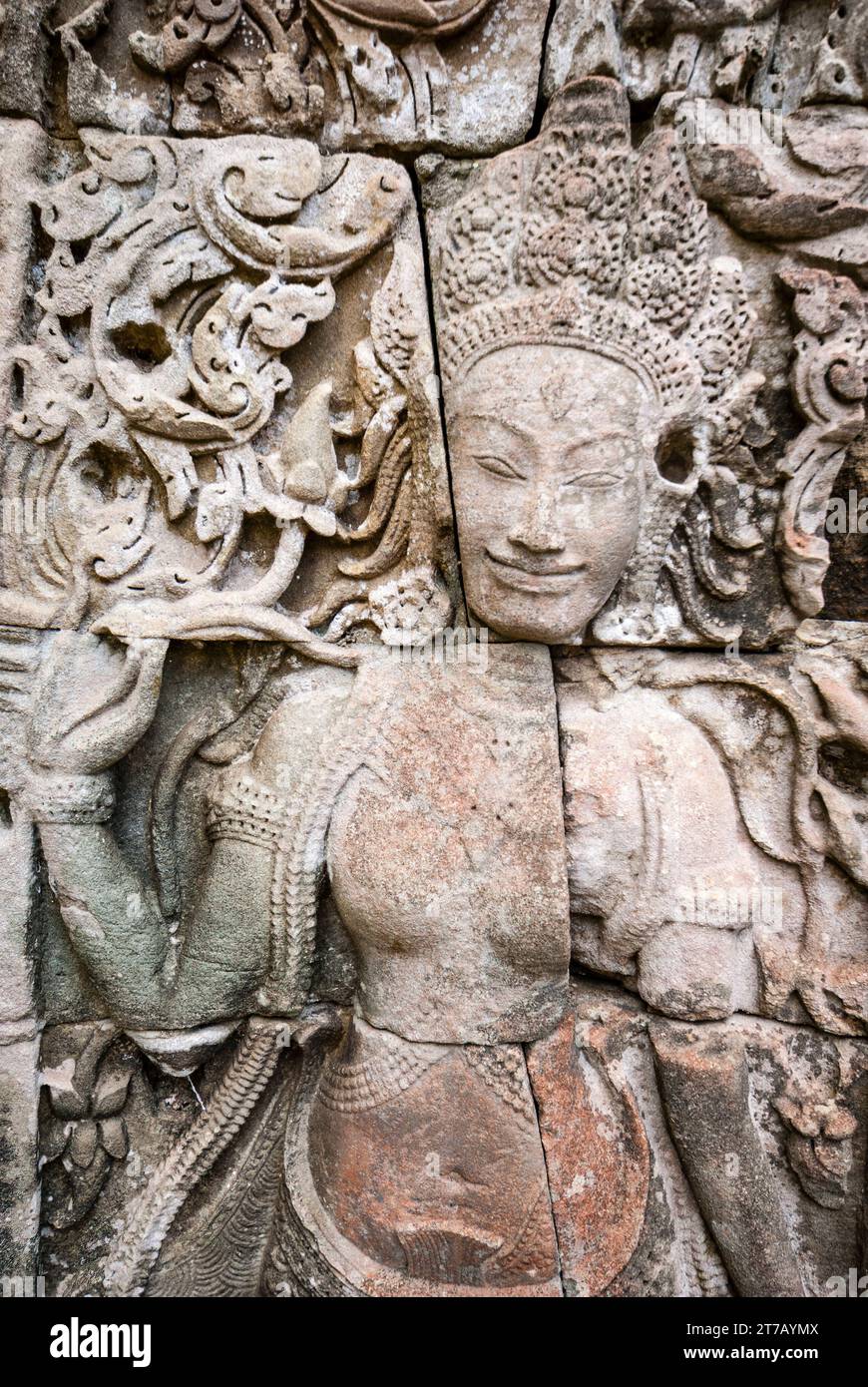 Female sculpture on the facade of Angkor Thom Bayon, Angkor. Cambodia ...