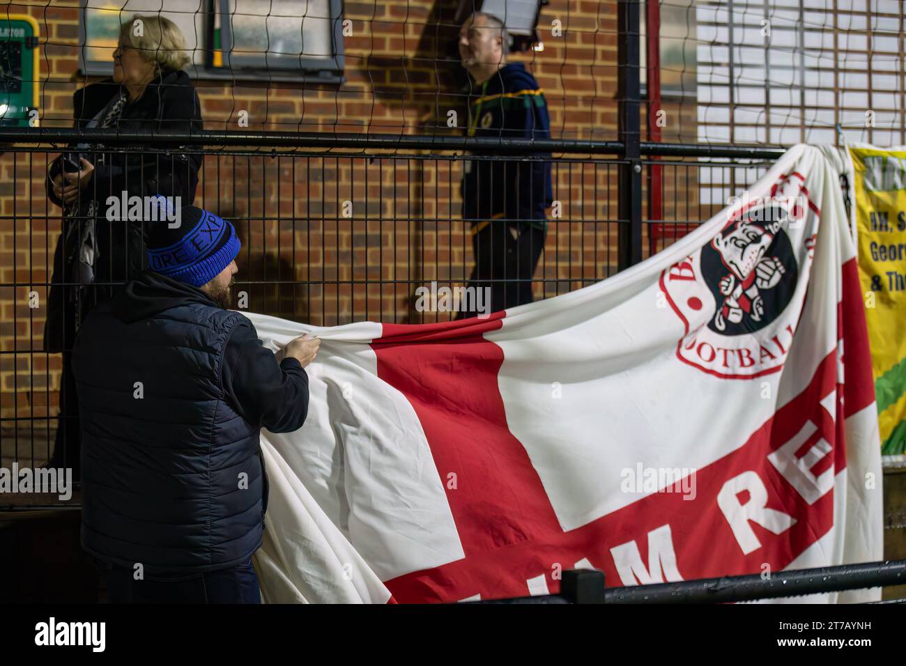 Barnsley fans putting up flags during the Emirates FA Cup match Horsham ...