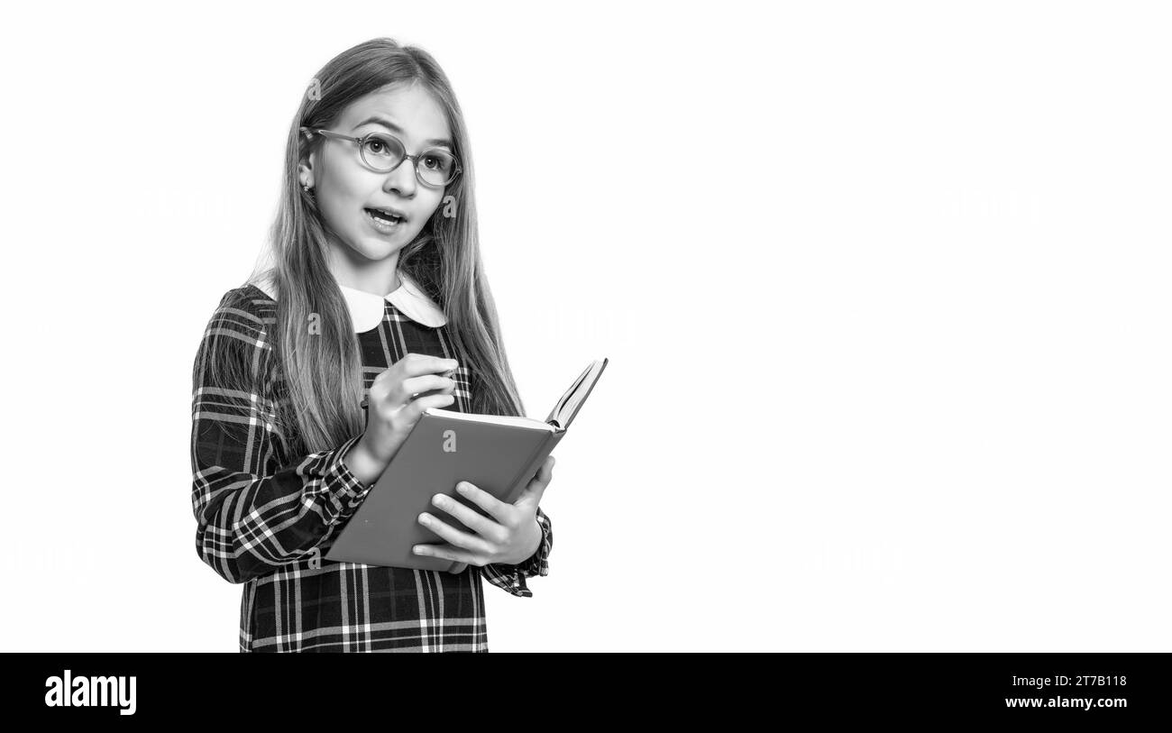 amazed school girl in noting notes isolated on white background. school ...