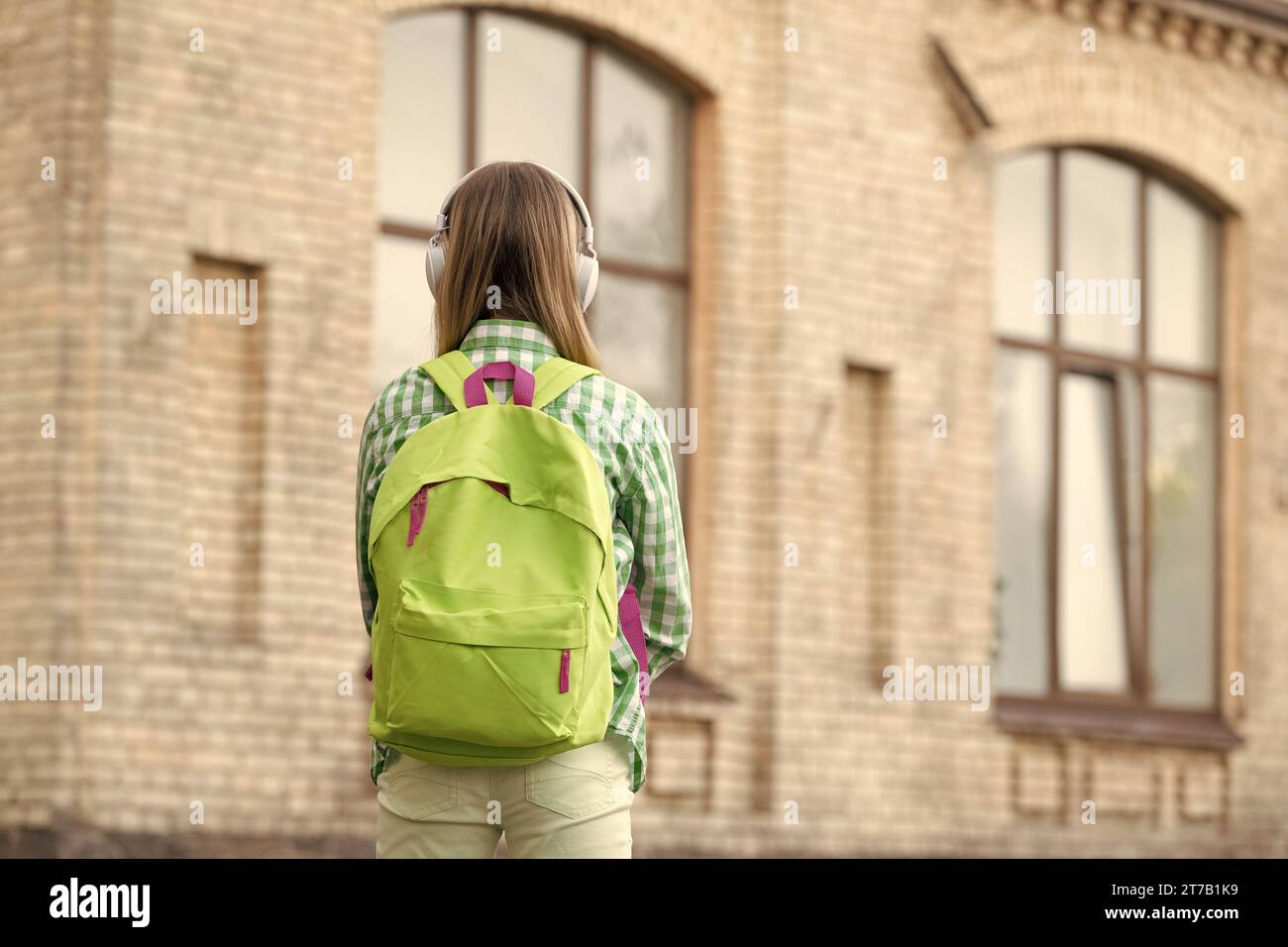back view of school education of teen girl outdoor. school education of ...