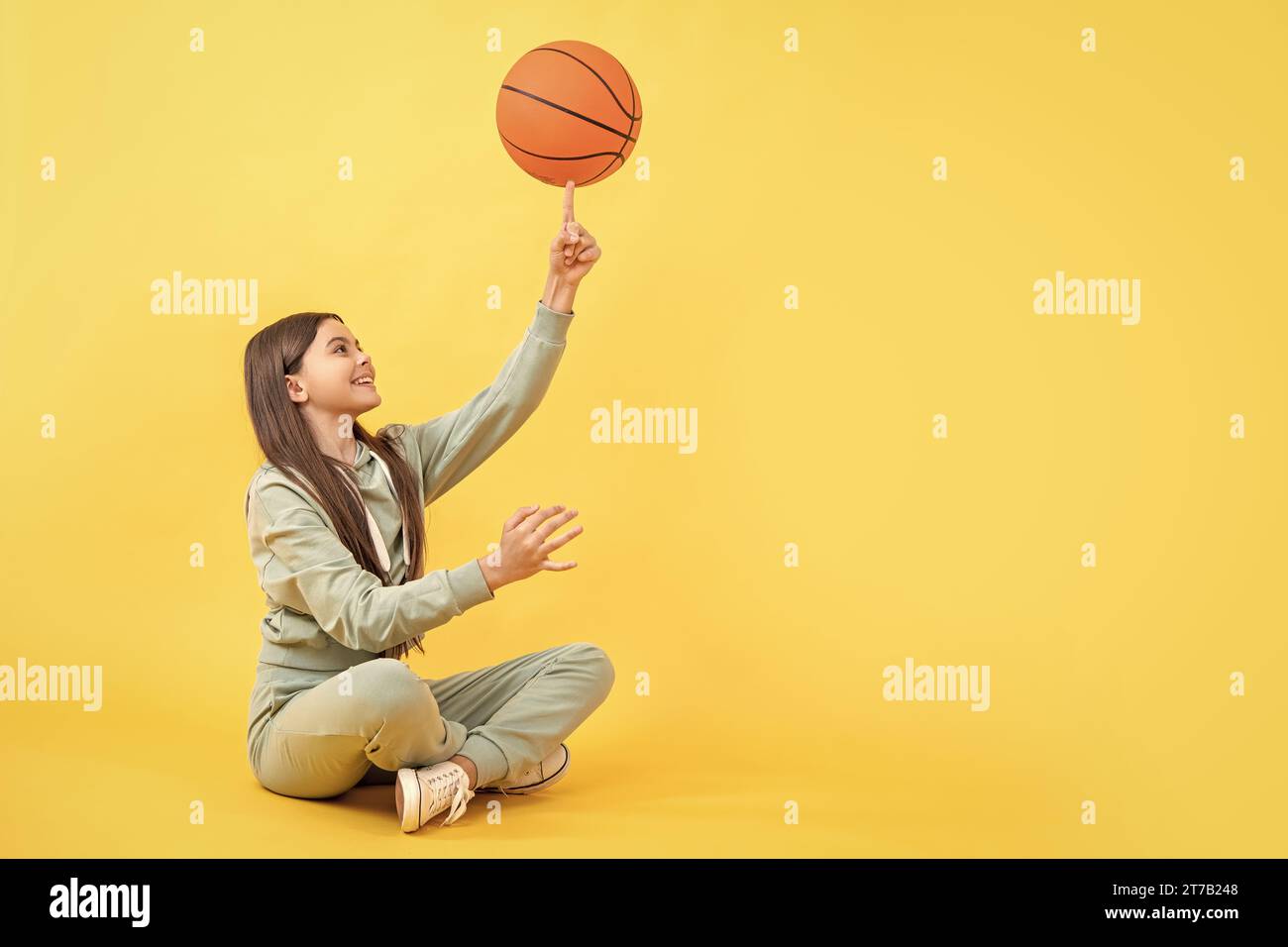 teen basketball girl on background advertisement. photo of teen ...