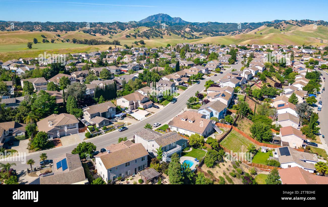 Aerial images over a community in Antioch, California with houses with ...