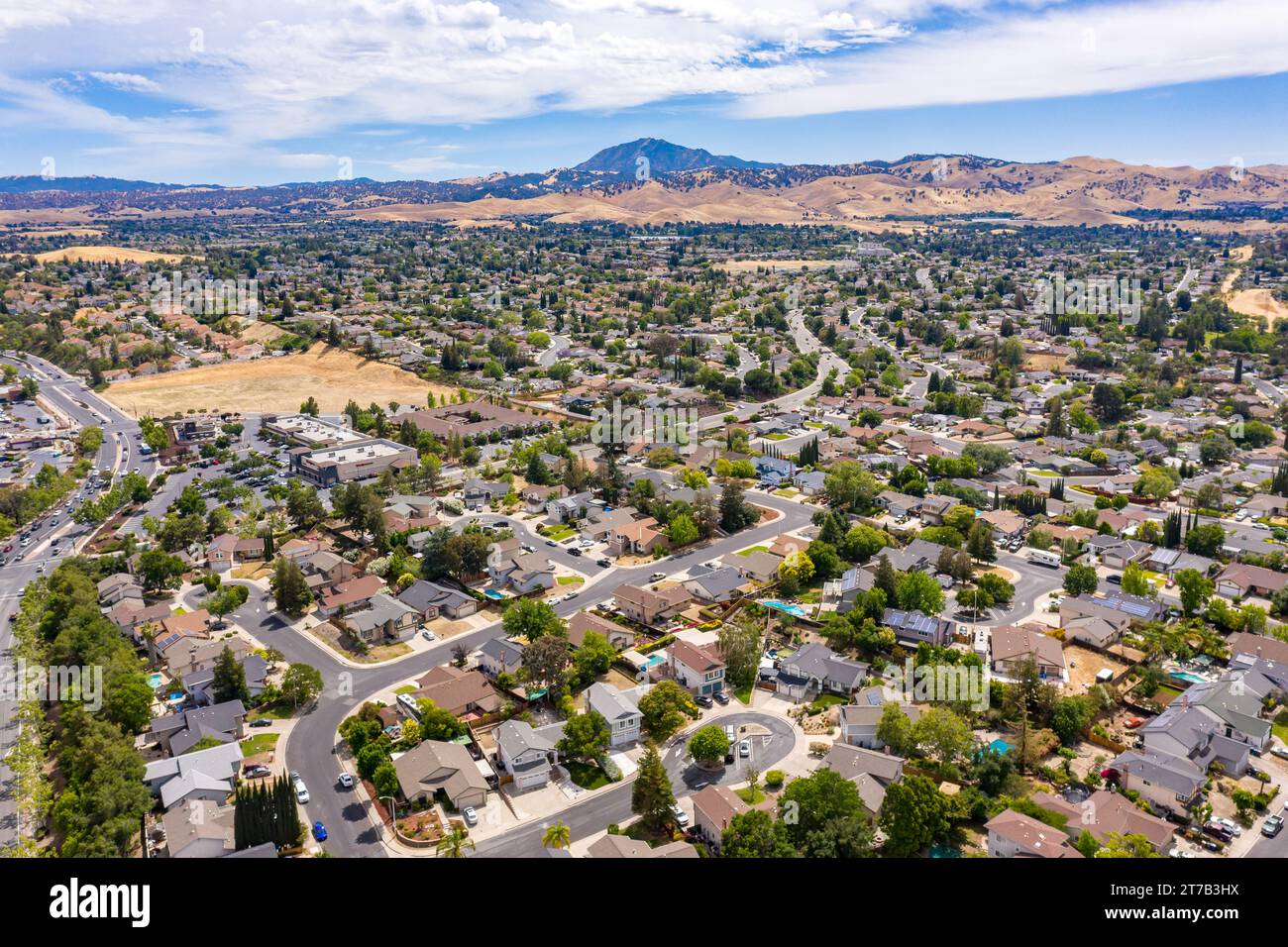 Aerial images over a community in Antioch, California with houses with ...