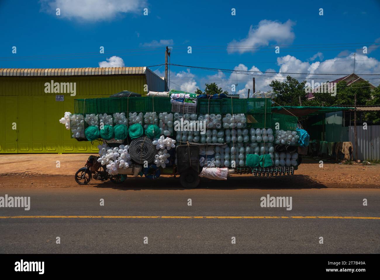 transport of plastic cans in vietnam Stock Photo - Alamy