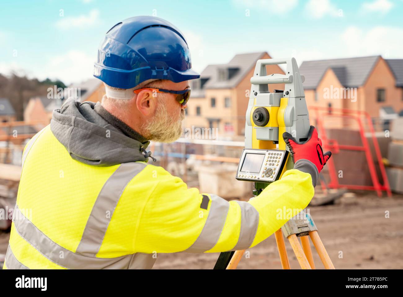Surveyor builder site engineer with theodolite total station at ...