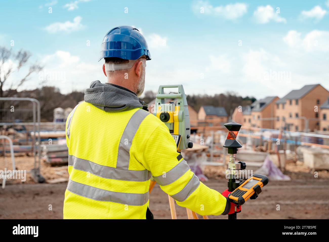 Surveyor builder site engineer with theodolite total station at ...