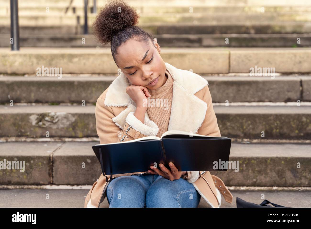 Person sad writing journal hi-res stock photography and images - Alamy