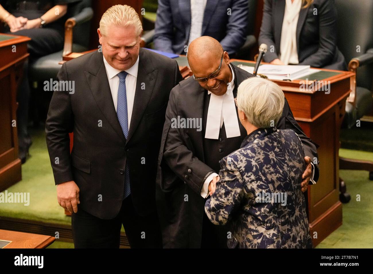 Toronto, Canada. 14th Nov, 2023. Edith Dumont, right, shakes hands with ...