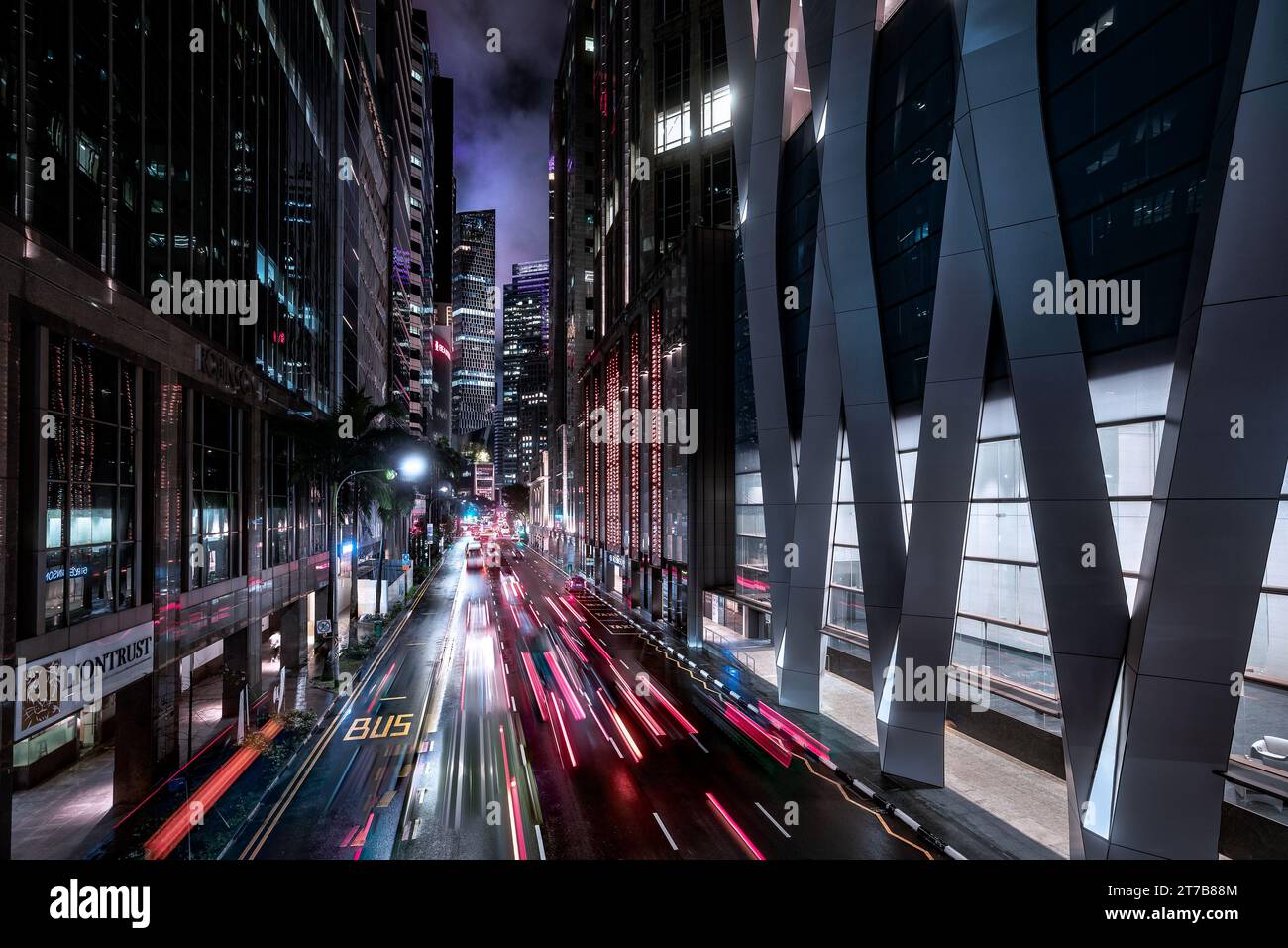 A bustling metropolitan area, filled with twinkling streetlights and ...