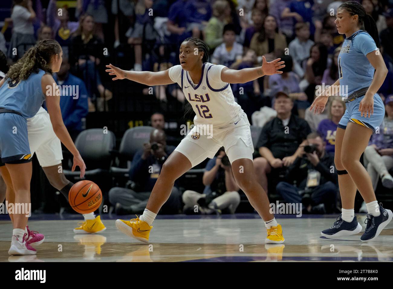 LSU guard Mikaylah Williams (12) defends during an NCAA basketball game ...
