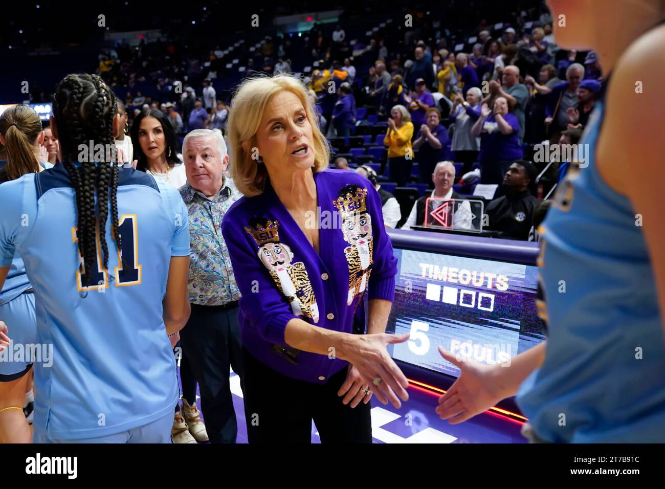 LSU head coach Kim Mulkey shakes hands with Kent State players after an ...