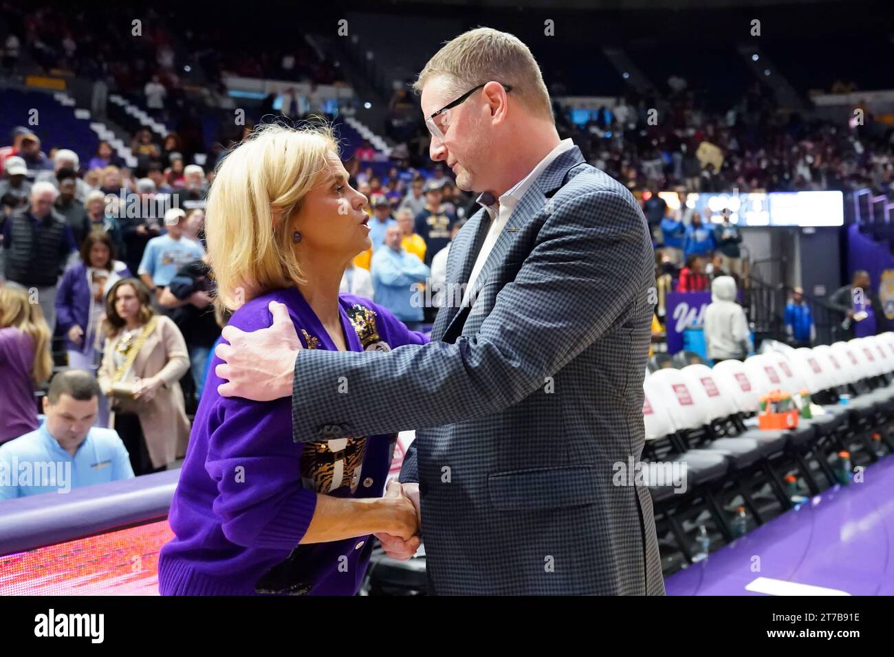 LSU head coach Kim Mulkey and Kent State head coach Todd Starkey greet ...