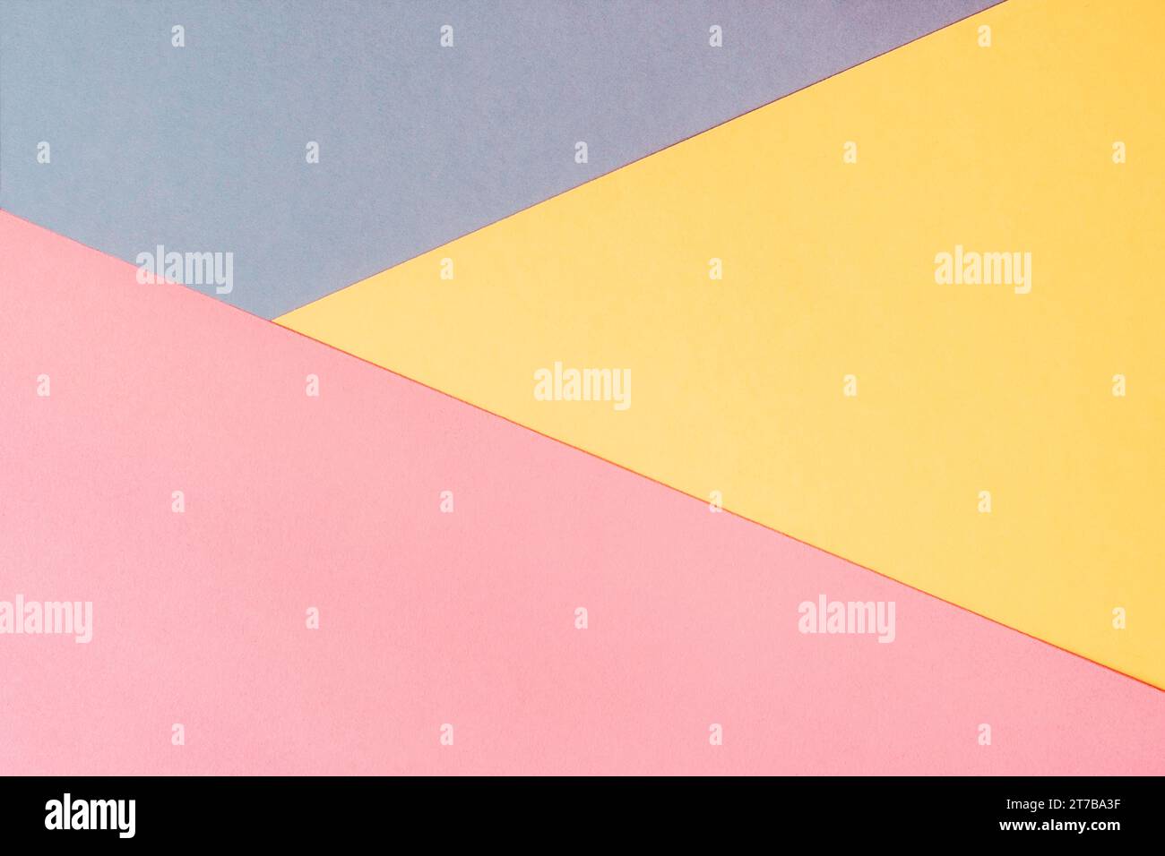 Yellow, pink and blue colored paper. Geometric empty paper background ...