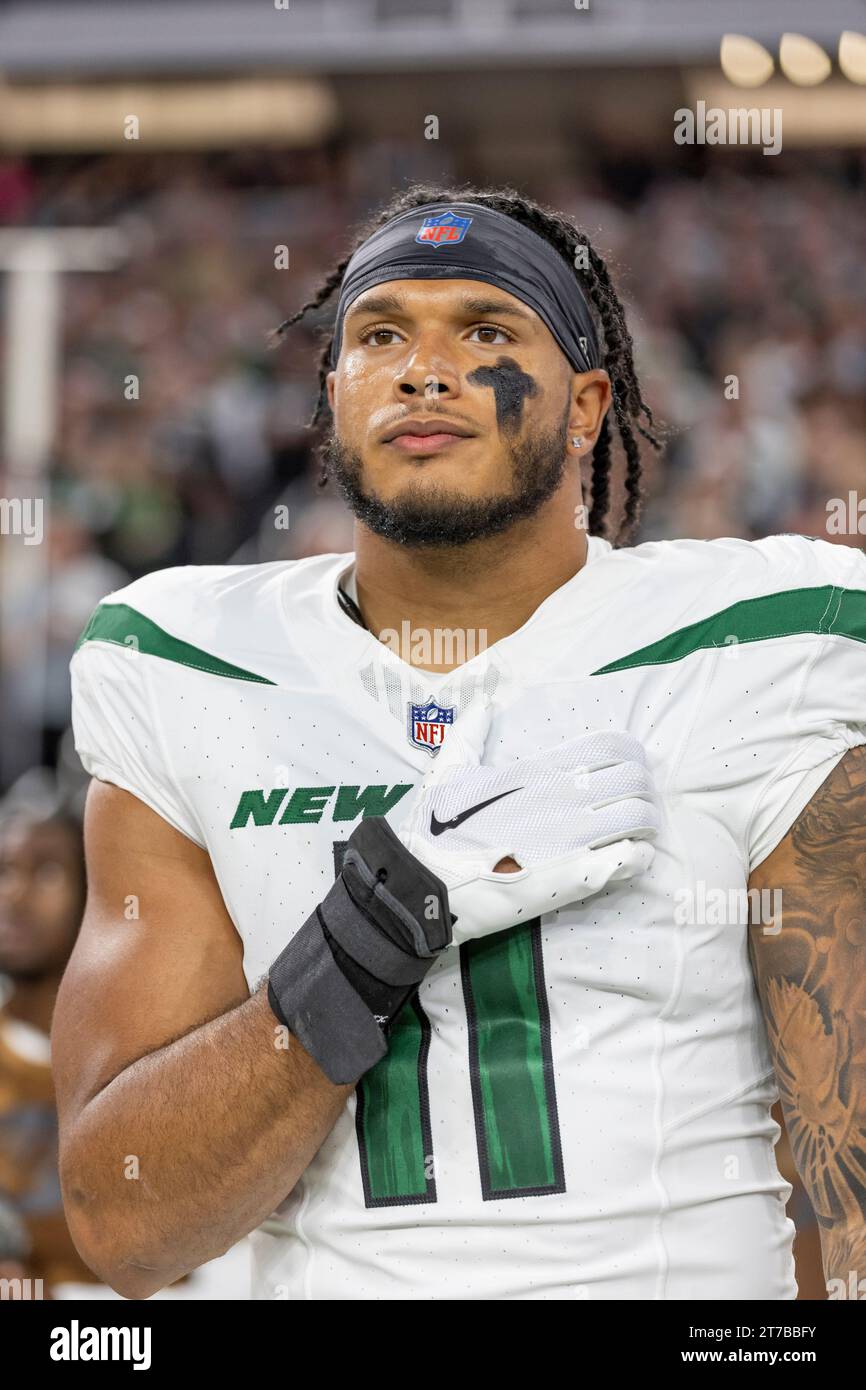 New York Jets linebacker Jermaine Johnson (11) stands for the National ...