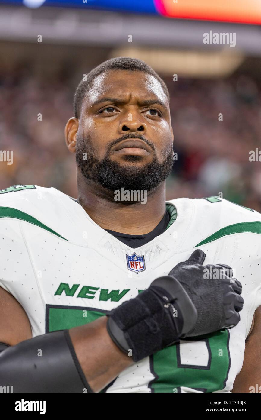 New York Jets guard Laken Tomlinson (78) stands for the National Anthem ...