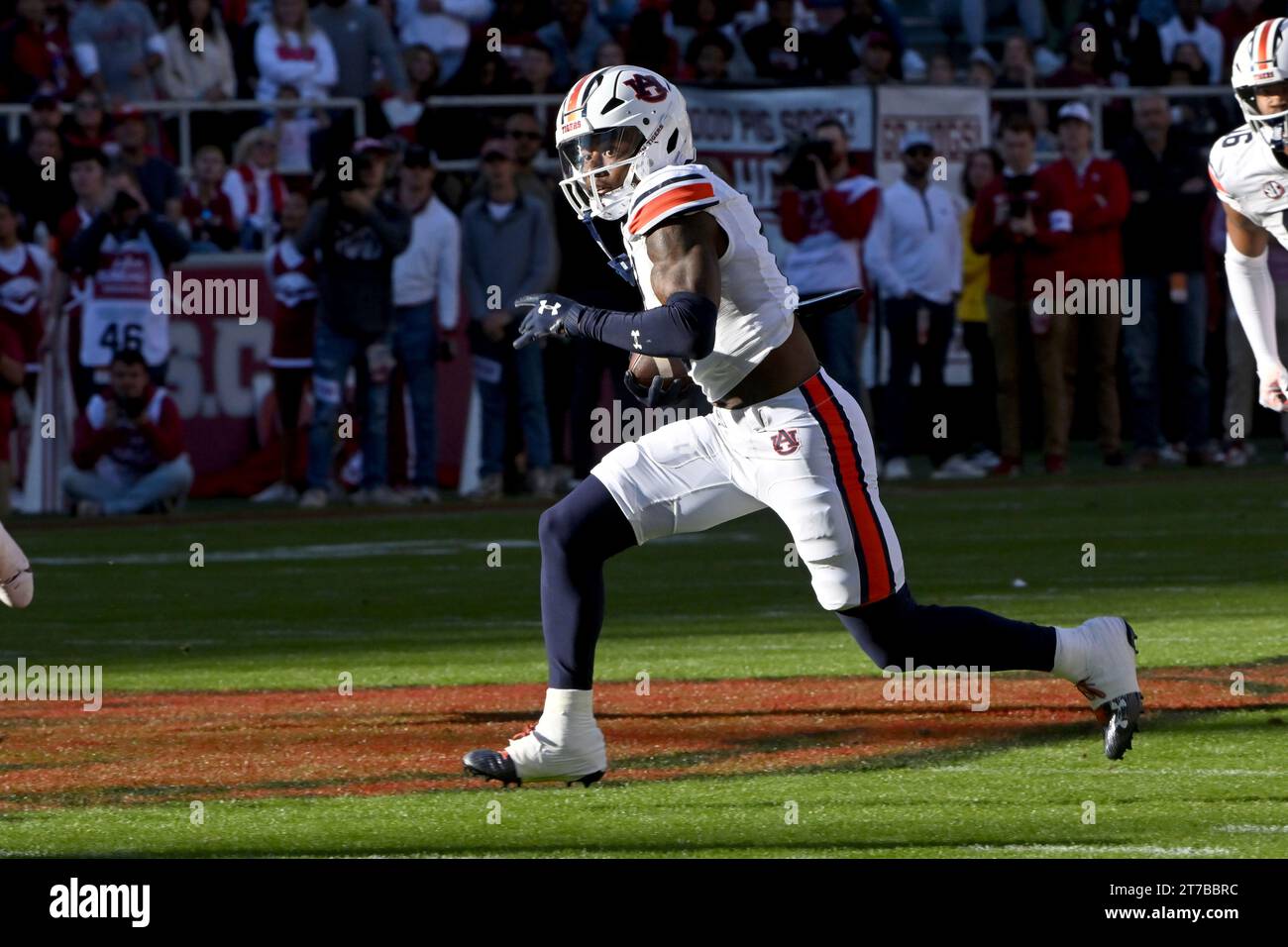 Auburn kick returner Keionte Scott (0) returns a punt for a touchdown ...