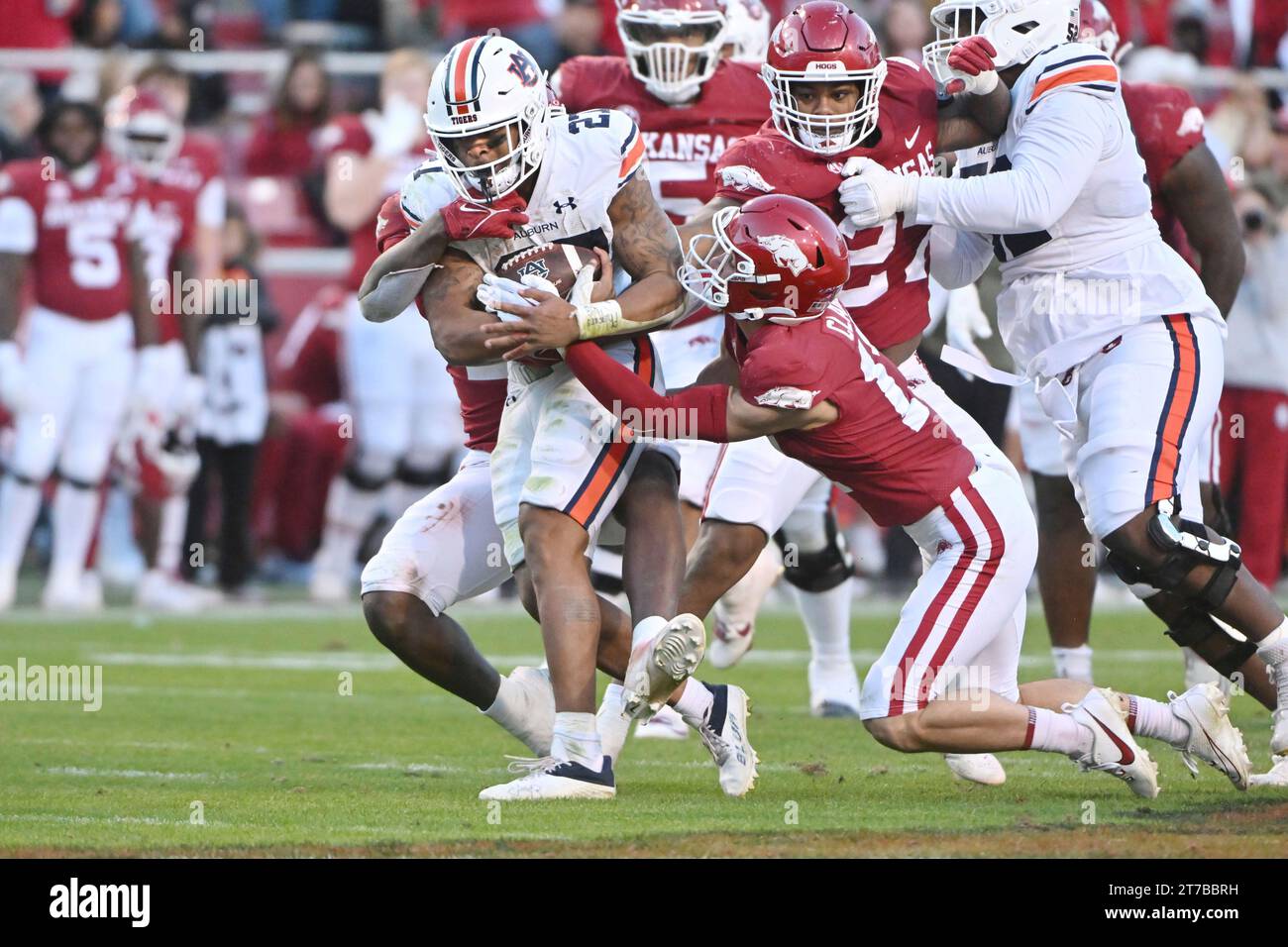 Auburn running back Jarquez Hunter (27) is tackled by Arkansas ...