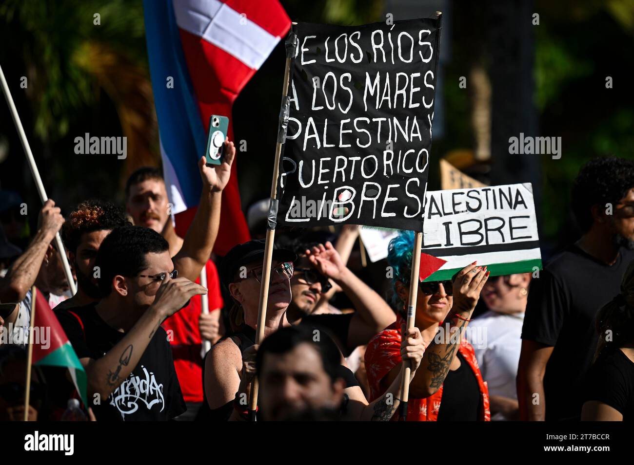 PUERTO RICO, SAN JUAN - NOVEMBER 12 Group of protesters shout their ...