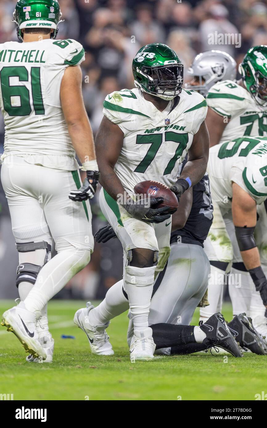 New York Jets tackle Mekhi Becton (77) against the Las Vegas Raiders in an NFL football game ...