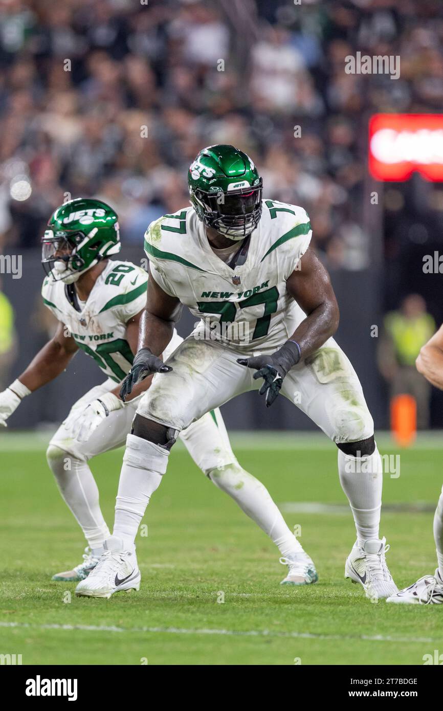 New York Jets safety tackle Mekhi Becton (77) blocks against the Las Vegas Raiders in an NFL ...