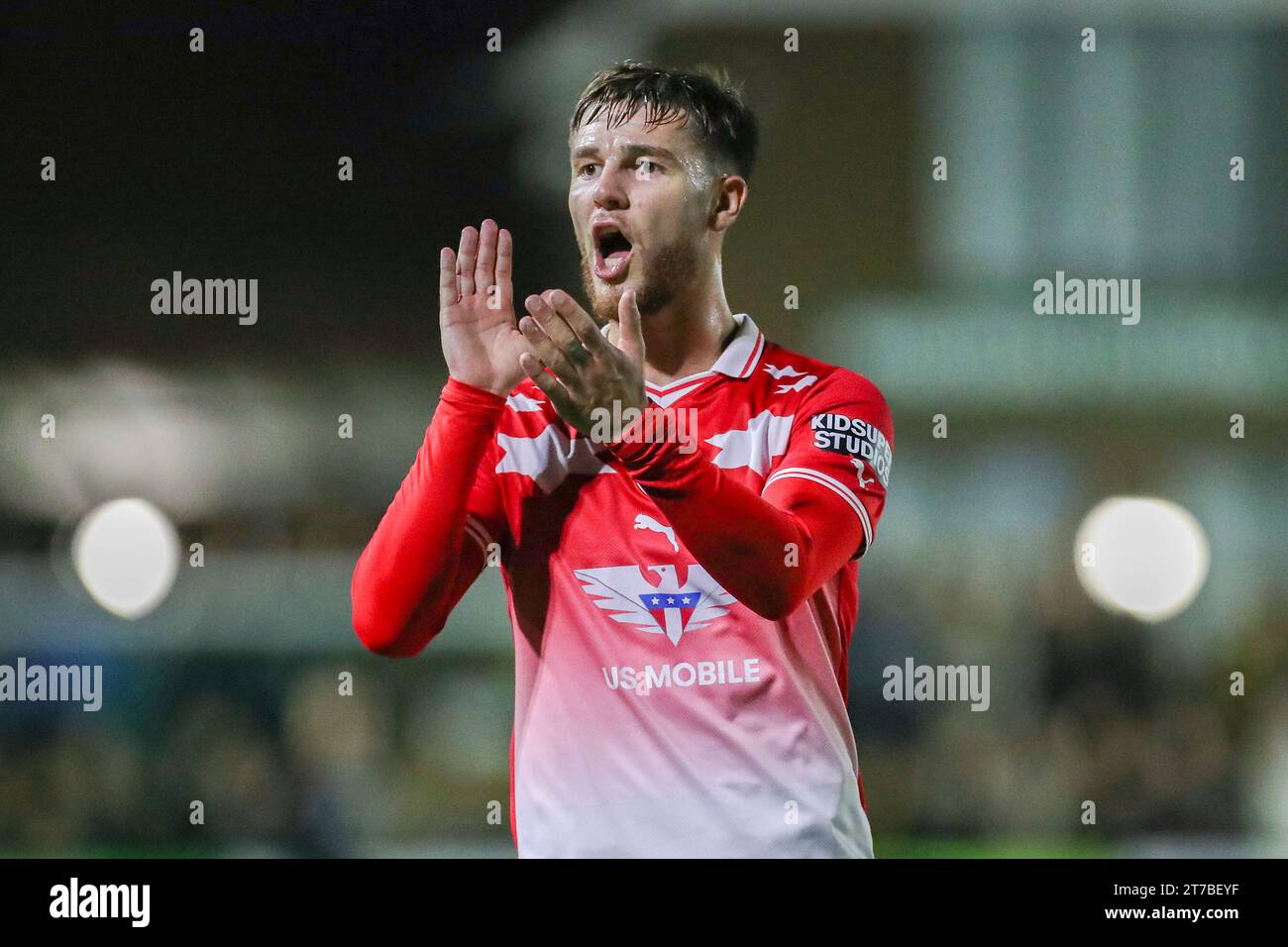 Horsham, UK. 14th Nov, 2023. Barnsley forward John McAtee (45) gestures ...