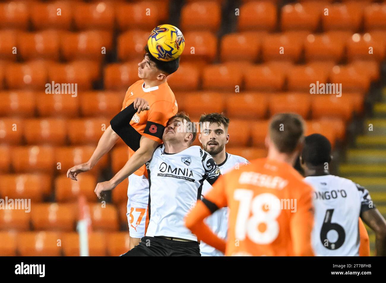 Luke Mariette #37 of Blackpool wins the header during the Bristol ...