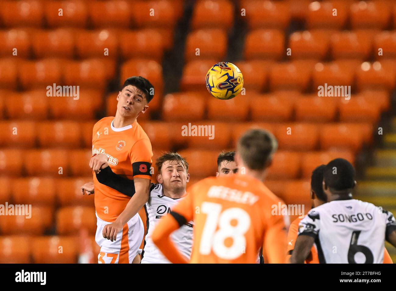 Luke Mariette #37 of Blackpool wins the header during the Bristol ...