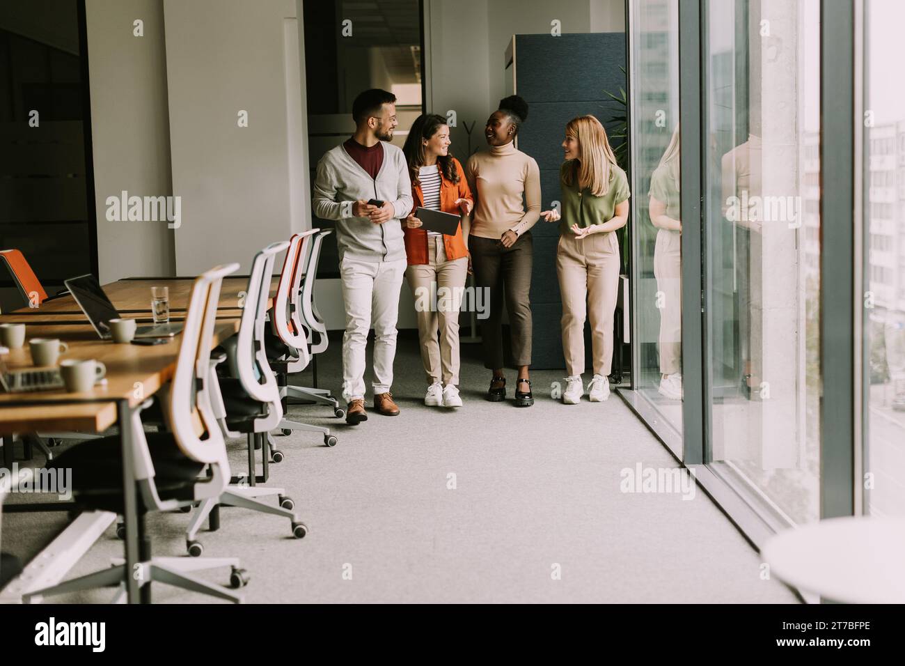 Modern walking office women hi-res stock photography and images - Alamy