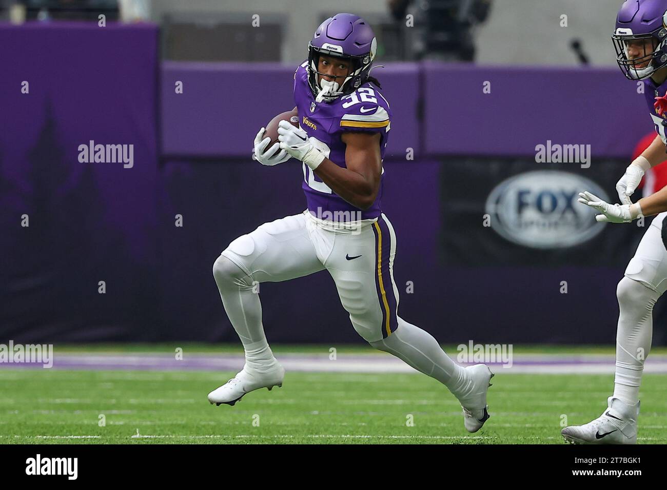 Minnesota Vikings running back Ty Chandler (32) runs the ball during ...