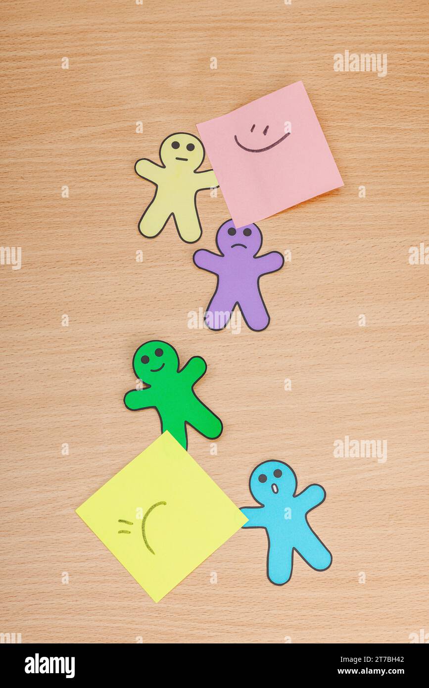 World mental health day. Paper men figures with different emotions ...