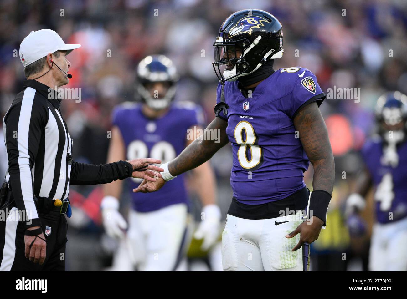 Baltimore Ravens quarterback Lamar Jackson (8) talks with referee Land ...