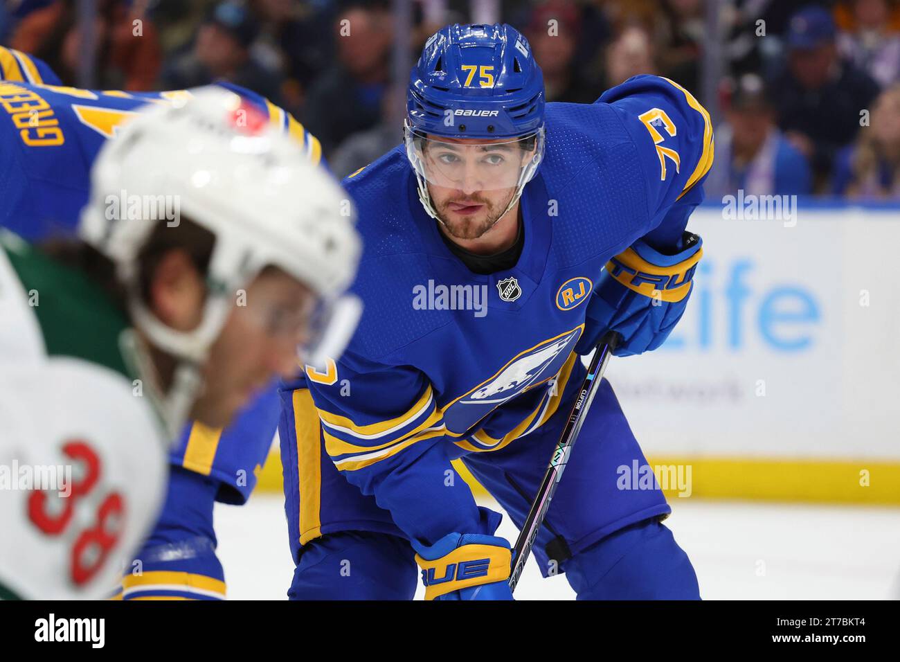 Buffalo Sabres defenseman Connor Clifton (75) lines up for a faceoff ...