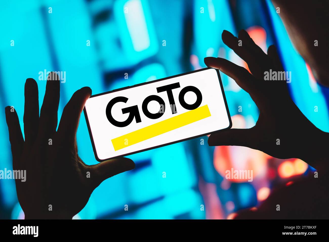 In this photo illustration, the GoTo Meeting logo is displayed on a ...