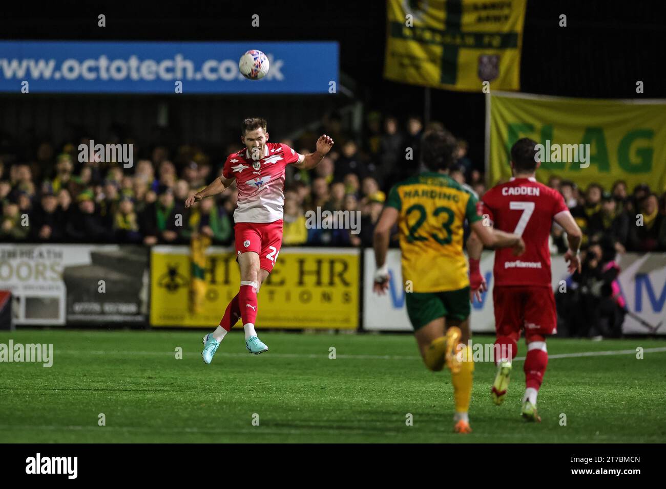 Jamie McCart #26 of Barnsley heads clear during the Emirates FA Cup ...