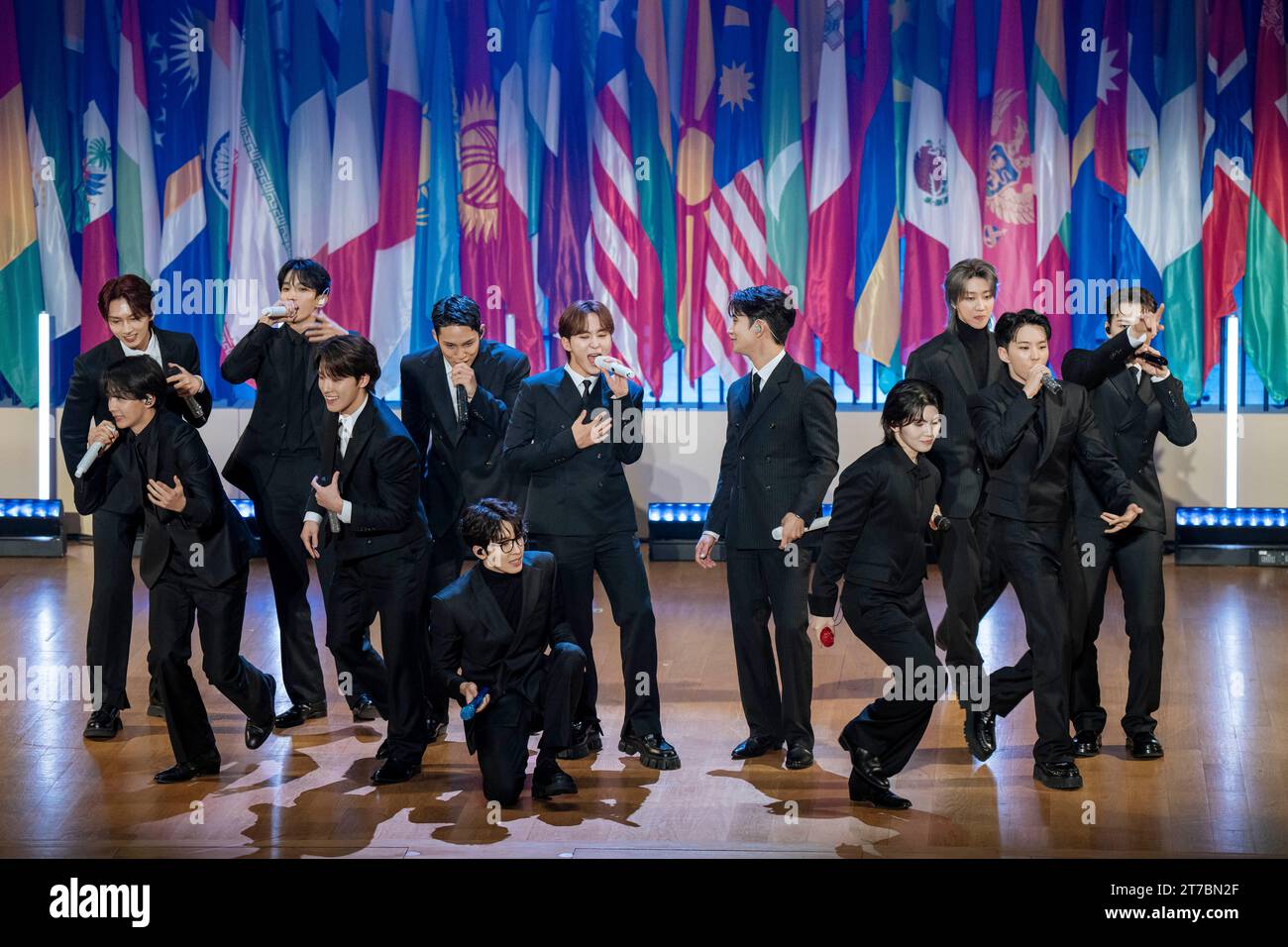 SEVENTEEN group members dance and sing during a show at Unesco in Paris ...