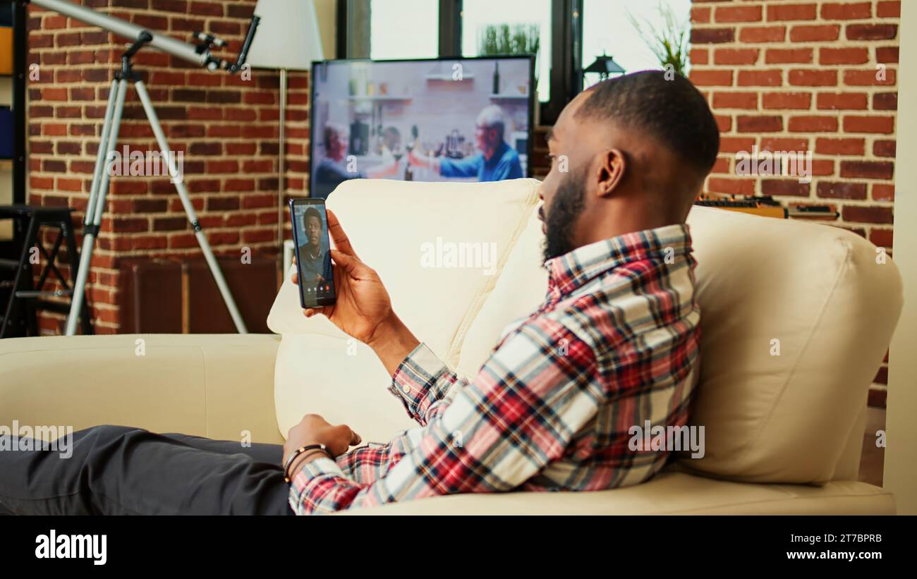 African american employee having one on one chat with coworker over ...
