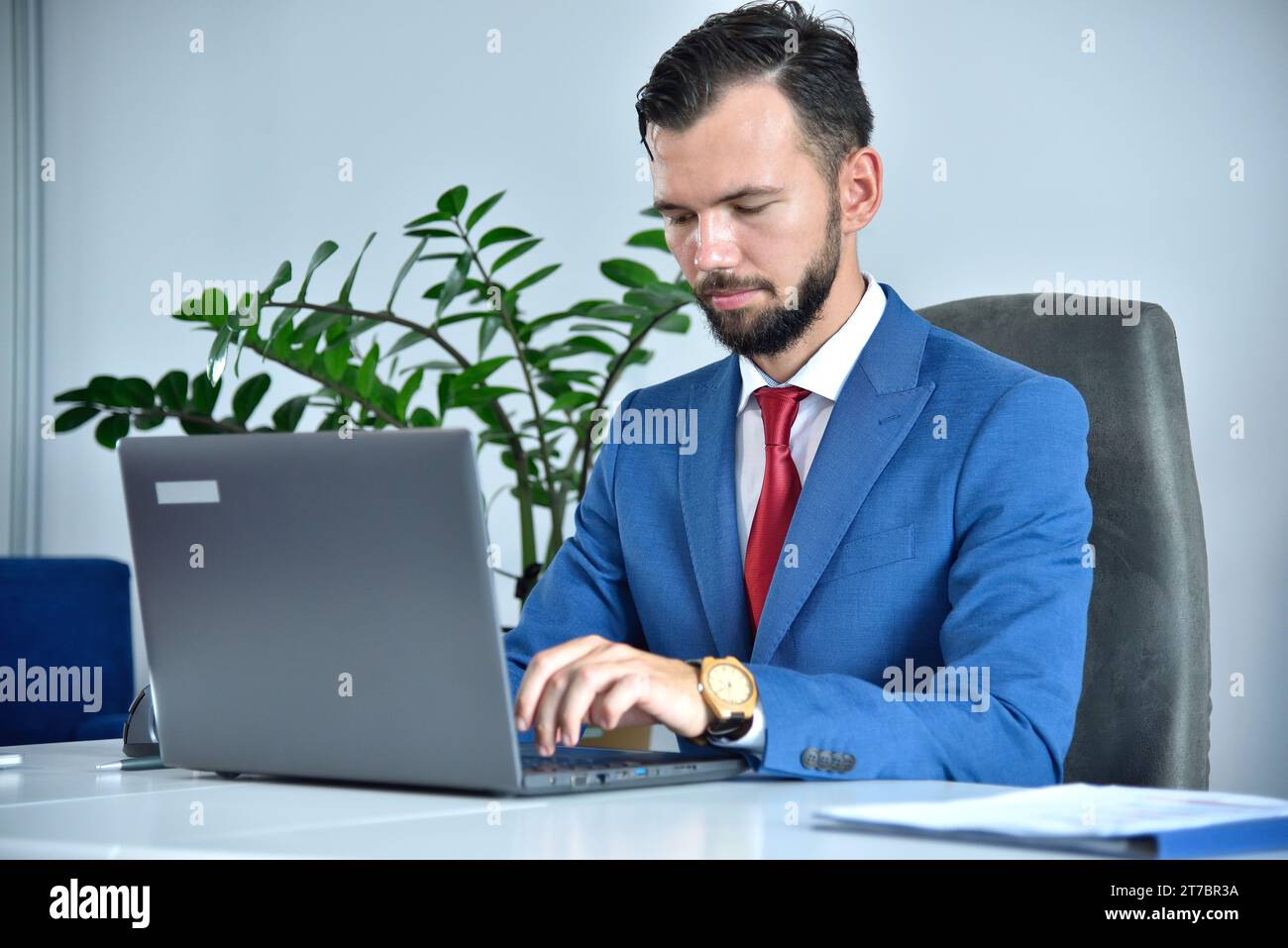 Accountant man working in office and typing on laptop. Occupation and ...