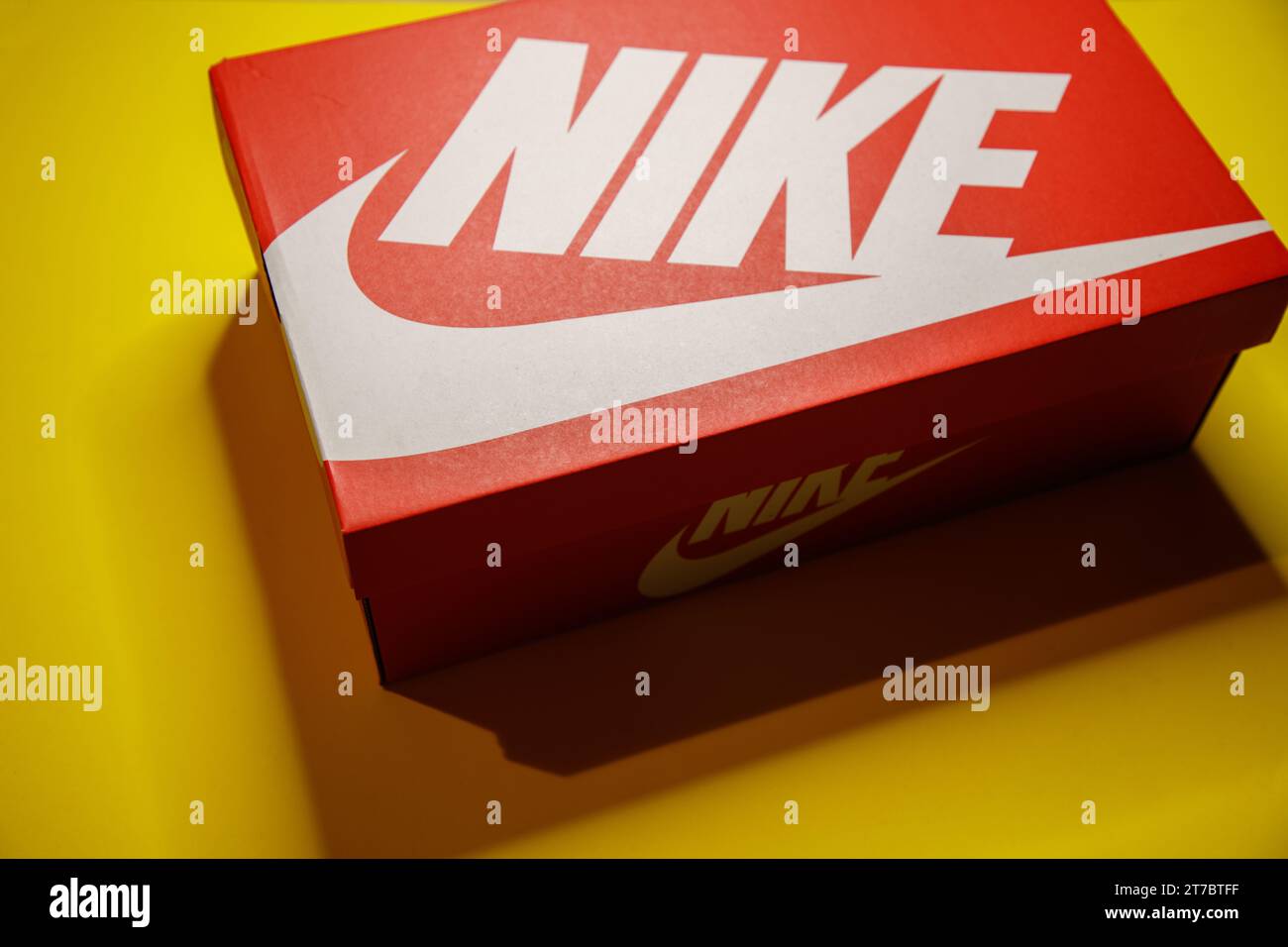 an original bright red vintage style "Nike" carboard shoe box, with ...