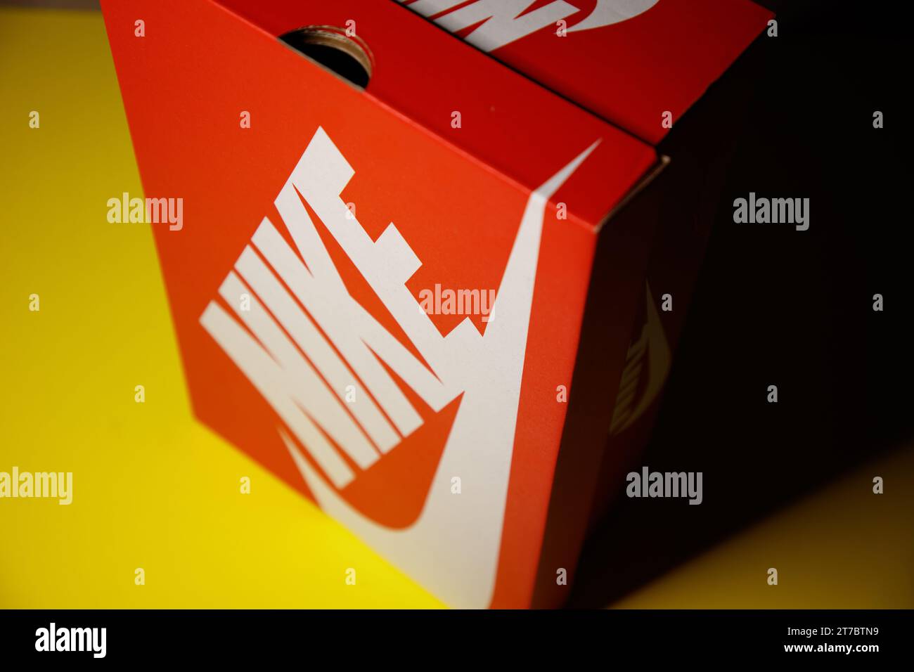 an original bright red vintage style "Nike" carboard shoe box, with ...