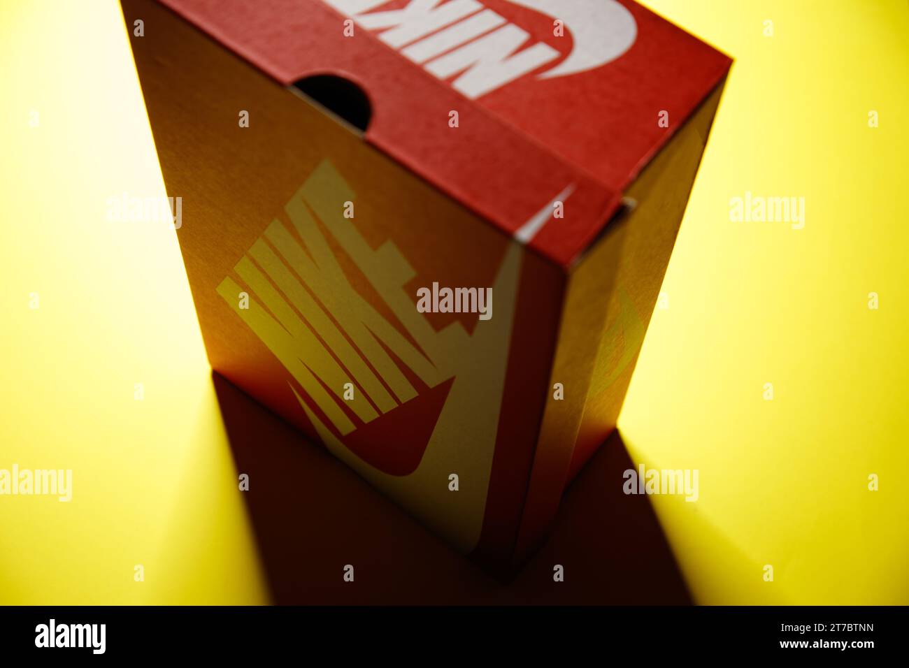 an original bright red vintage style "Nike" carboard shoe box, with ...