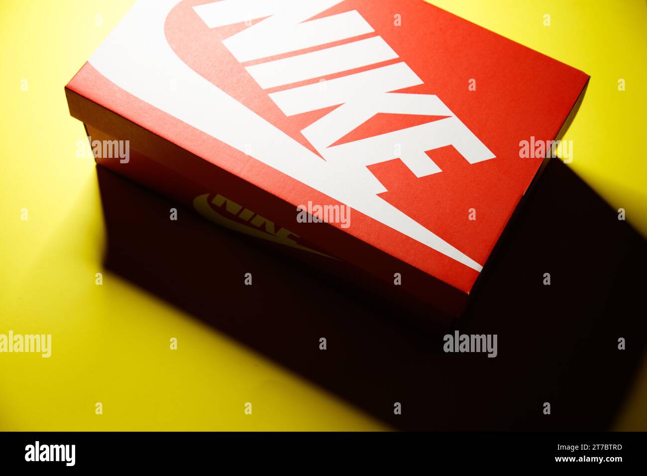 an original bright red vintage style "Nike" carboard shoe box, with ...
