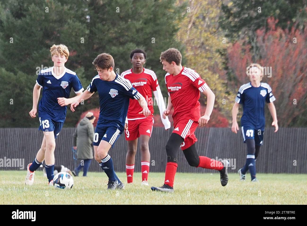 The teen-aged boys are playing a very competitive soccer game Stock ...