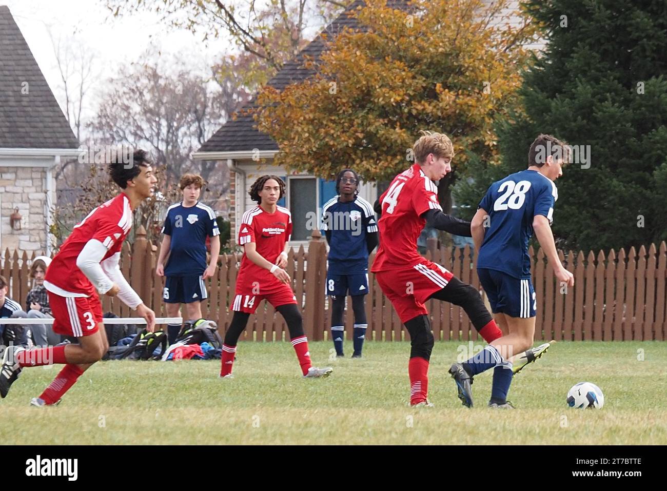 The teen-aged boys are playing a very competitive soccer game Stock ...