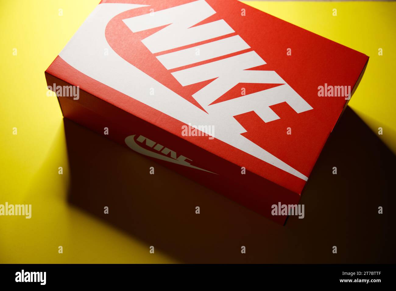 an original bright red vintage style "Nike" carboard shoe box, with ...