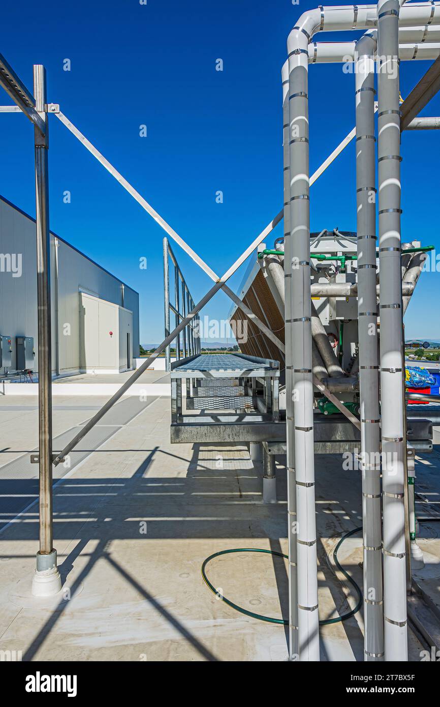A look through a pipe support framework toward an adiabatic condenser ...