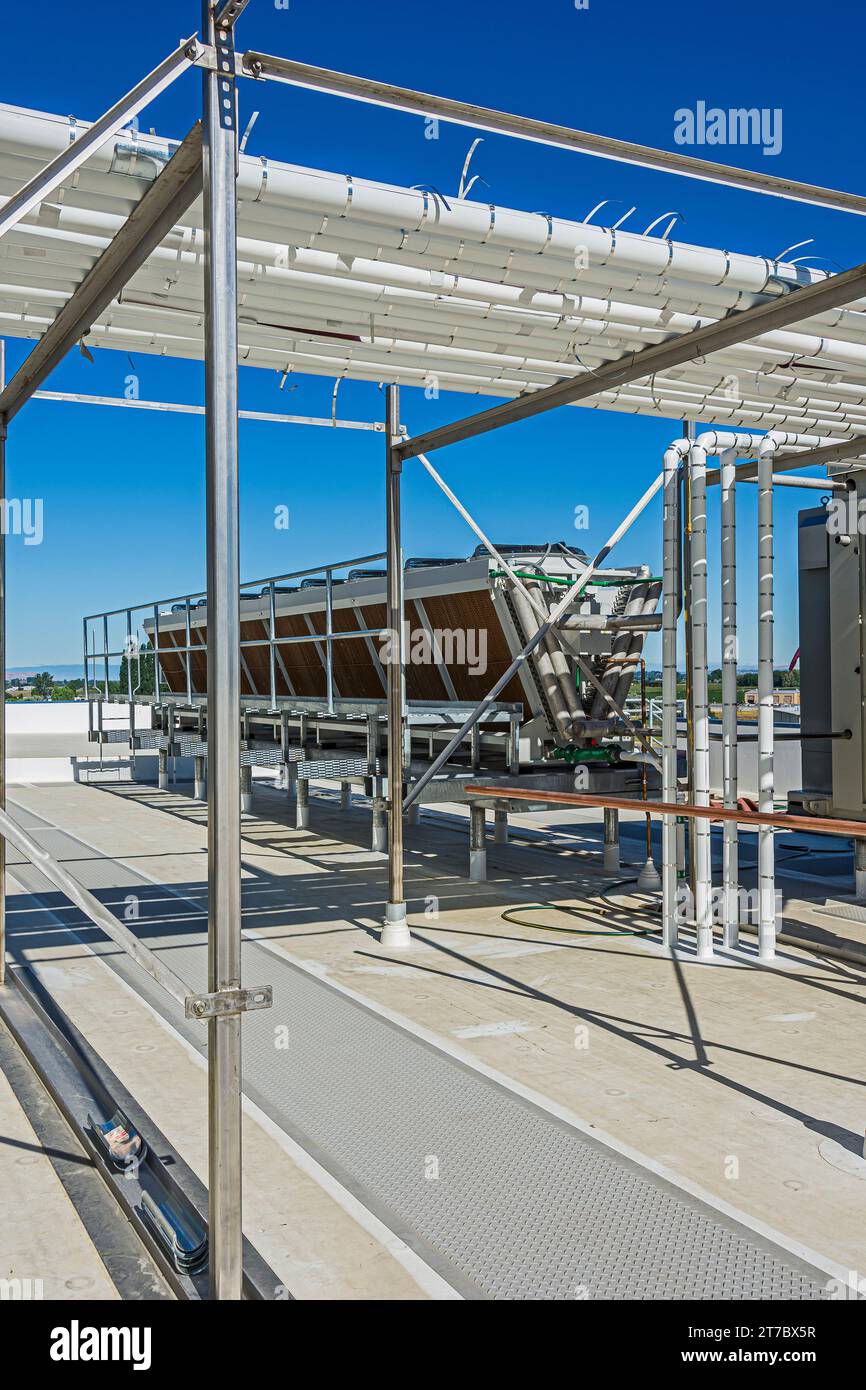 A look through a pipe support framework toward an adiabatic condenser ...