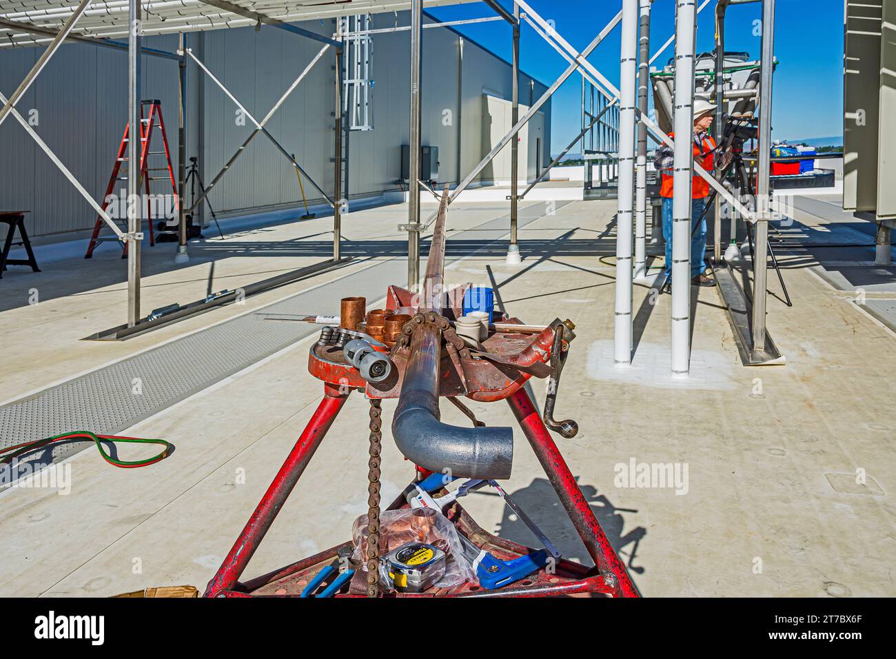 Length of copper pipe being readied for brazing on the roof of a CO2 ...