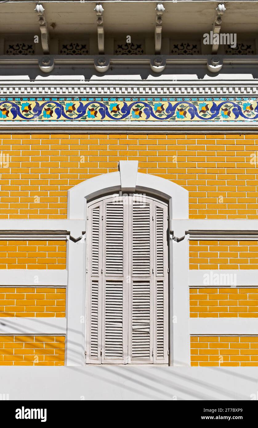 Ancient window on yellow facade in Petropolis, Rio de Janeiro, Brazil ...